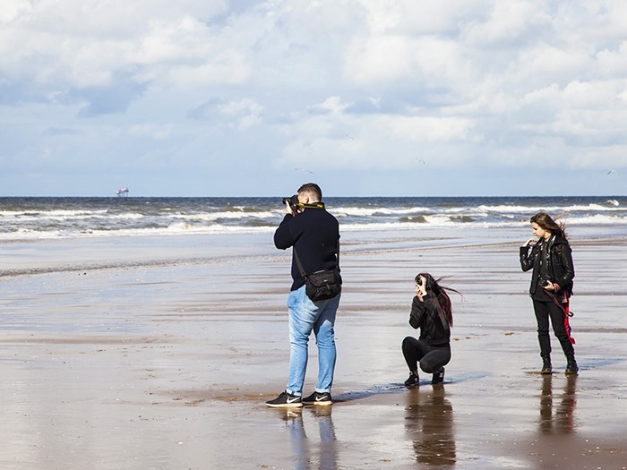 Photography students focus on the beach